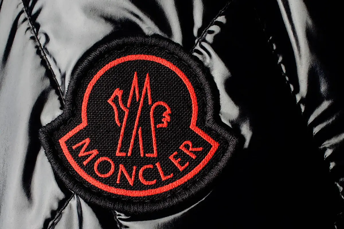 Moncler蒙克莱logo设计含义及服饰箱包品牌设计理念-诗宸标志设计