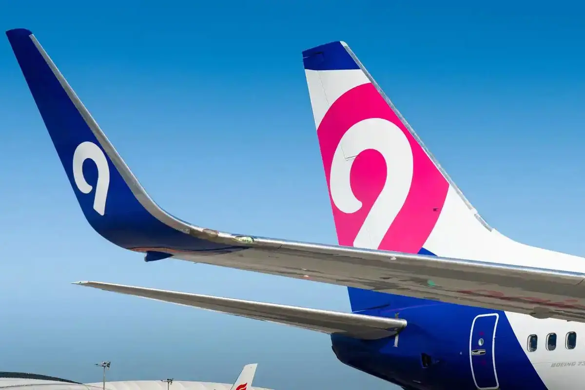 九元航空logo含义及航空品牌理念-诗宸标志设计